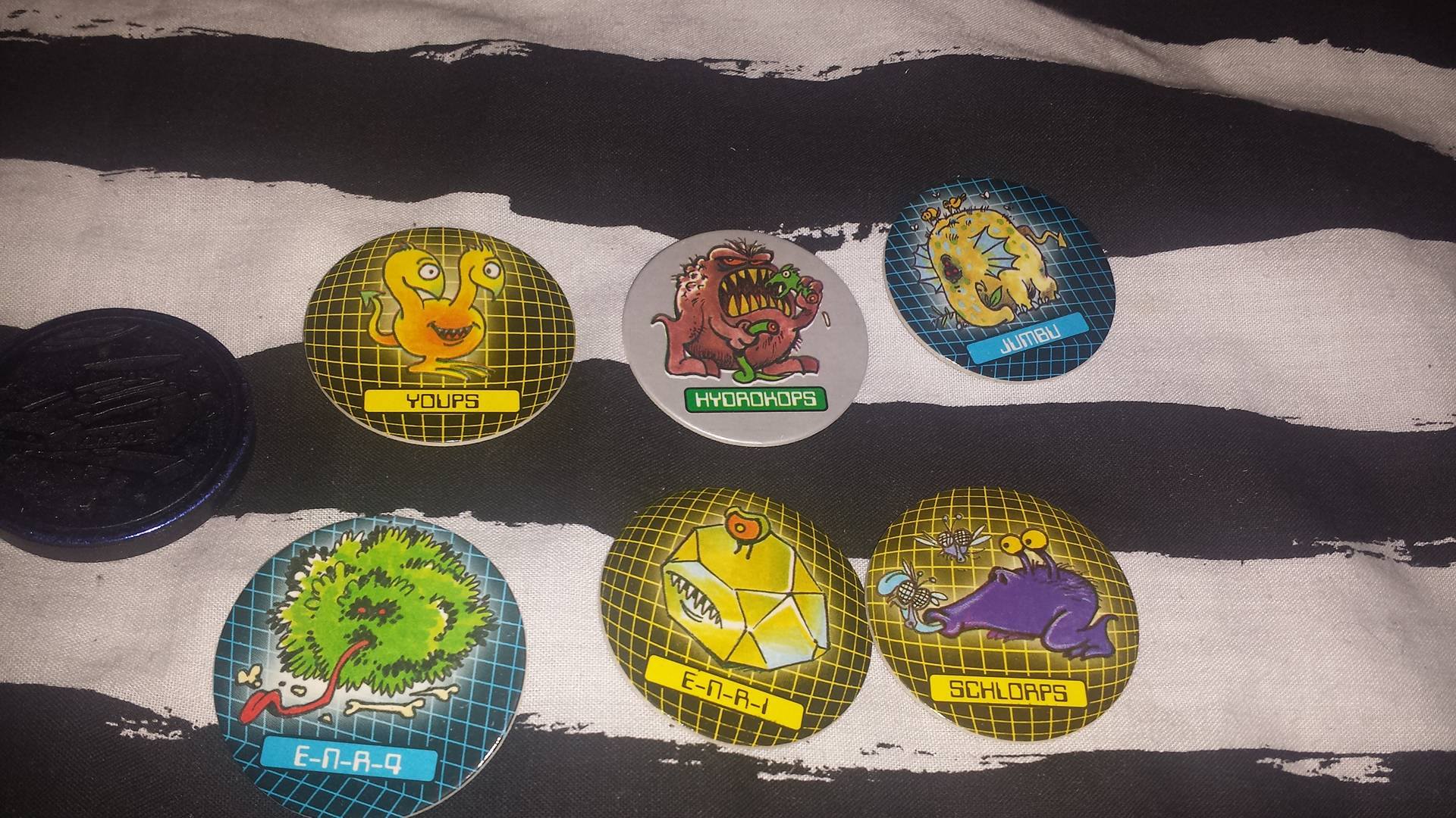 Opening packets of alien Pogs from 1995, and Star Wars Tazos! – The ...